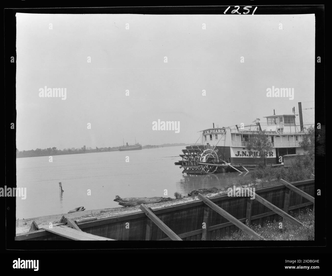 Paddle wheel steamboat on river, New Orleans. Genthe photograph ...