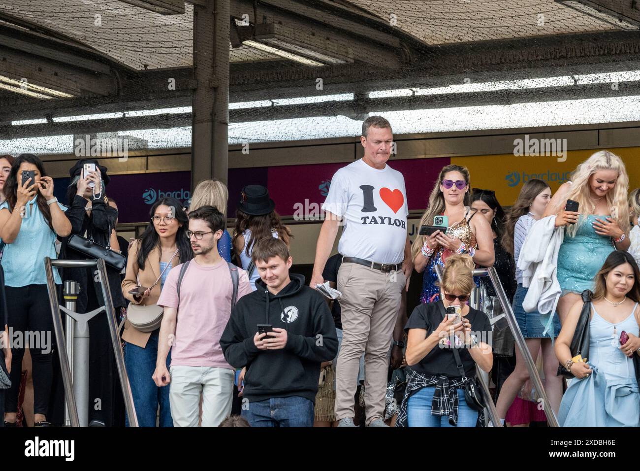 London, UK. 21 June 2024. Taylor Swift fans ('Swifties') at Wembley ...