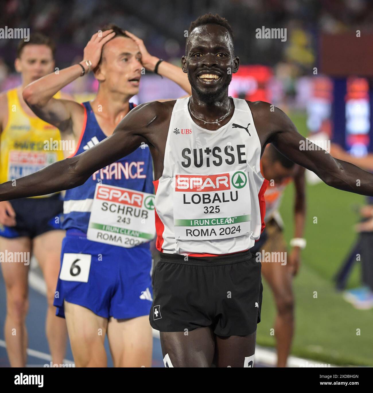 Dominic Lobalu of Switzerland celebrates his win in the men’s 10.000m ...