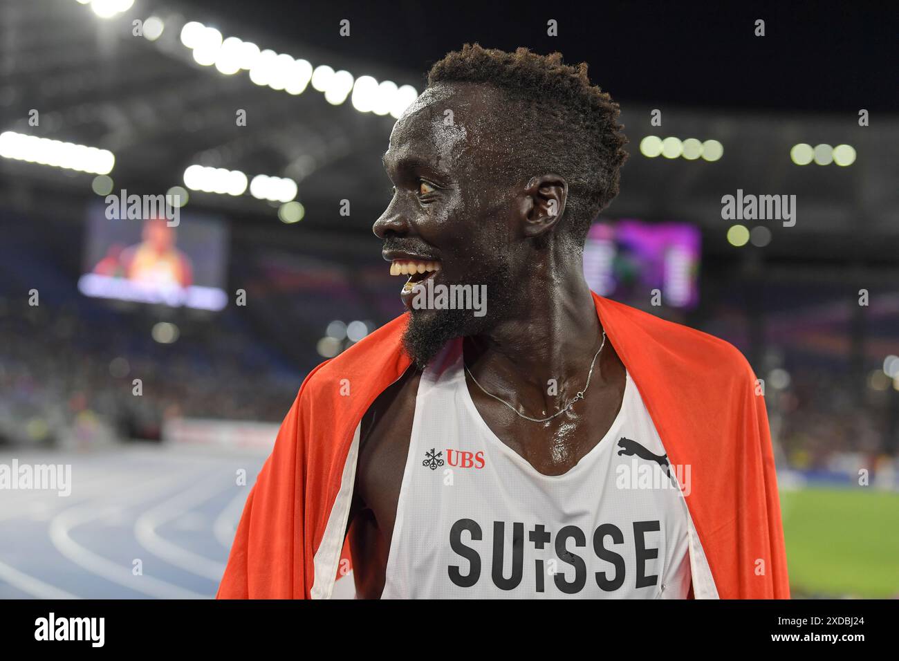Dominic Lobalu of Switzerland celebrates his win in the men’s 10.000m ...