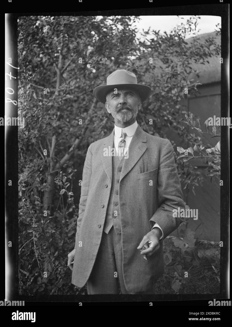 Unidentified man, standing outdoors. Genthe photograph collection Stock ...
