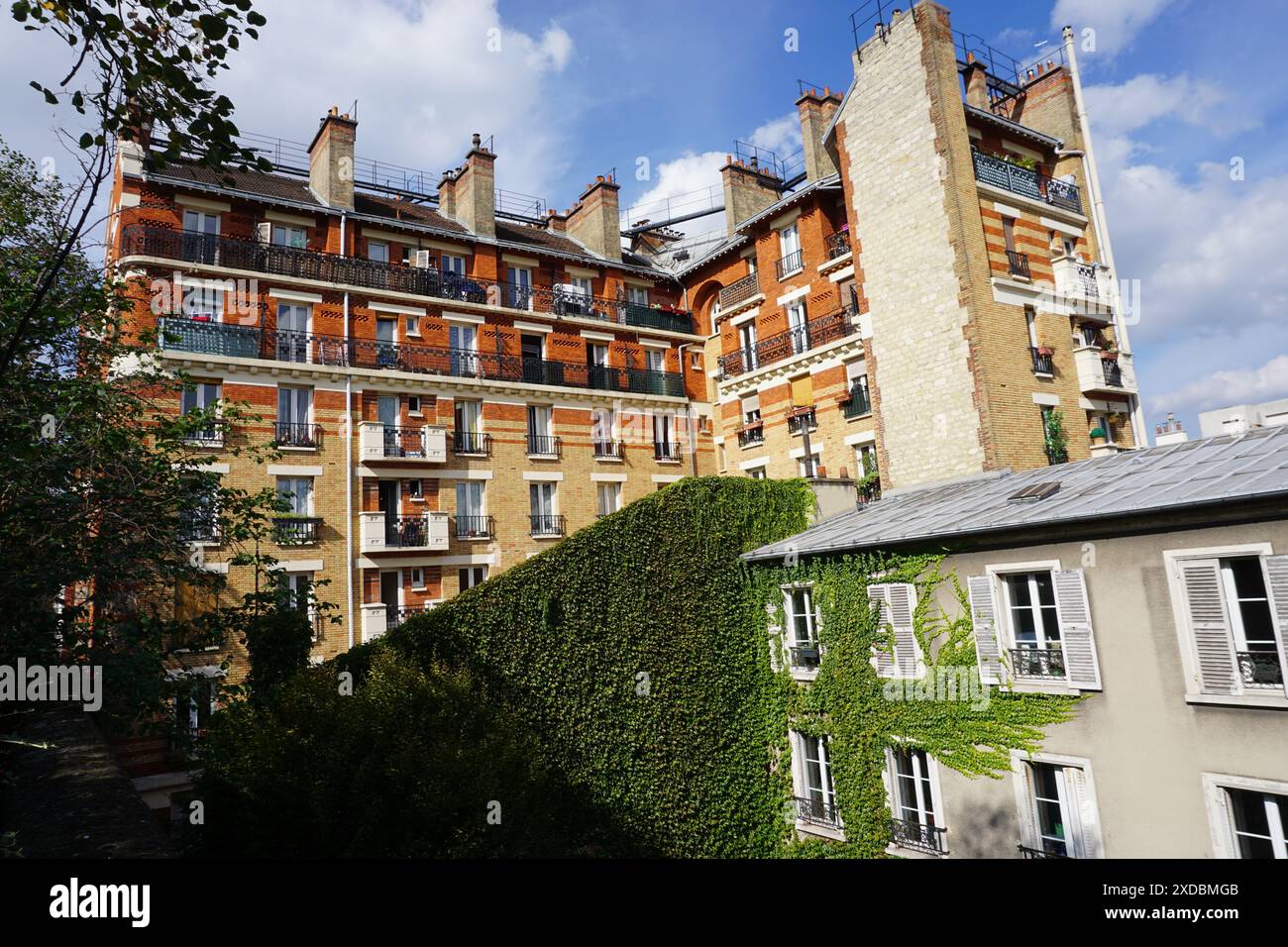 colorful buildings in Paris France with red bricks Stock Photo - Alamy