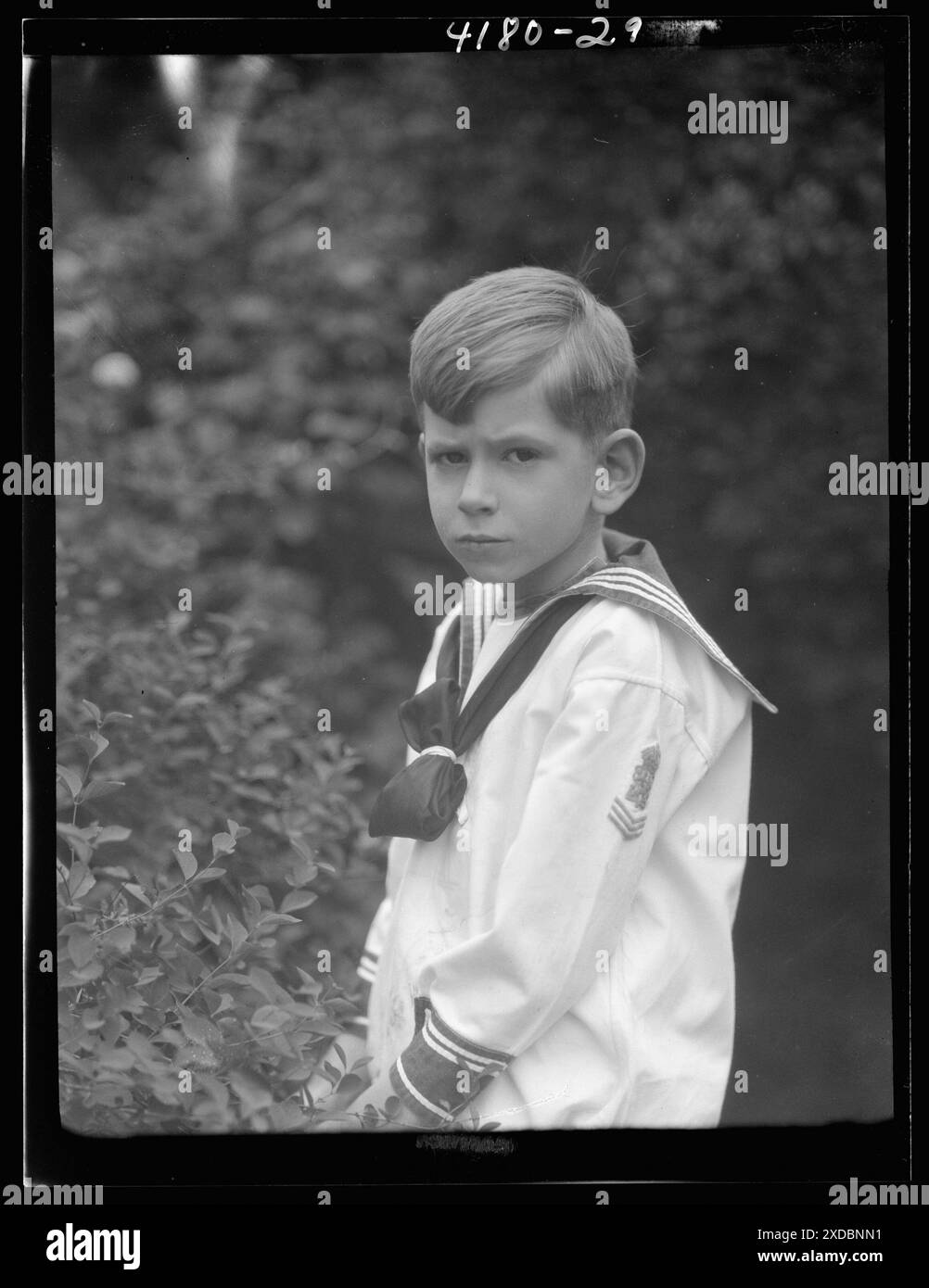 McCormick, Medill, child of, standing outdoors. Genthe photograph ...