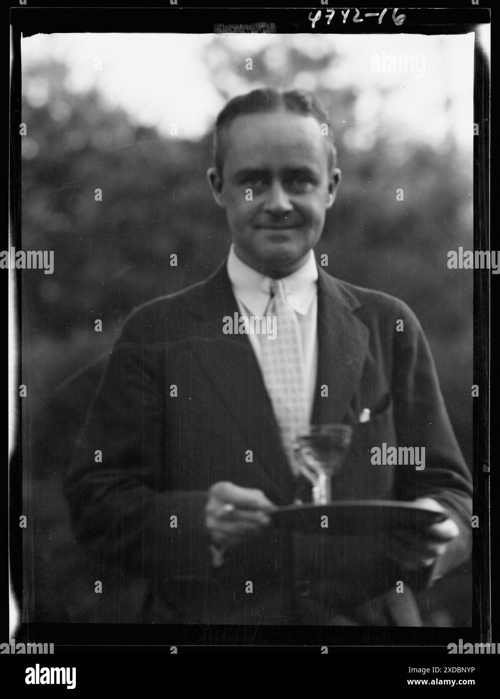 Dunning, Mr., standing outdoors. Genthe photograph collection Stock ...
