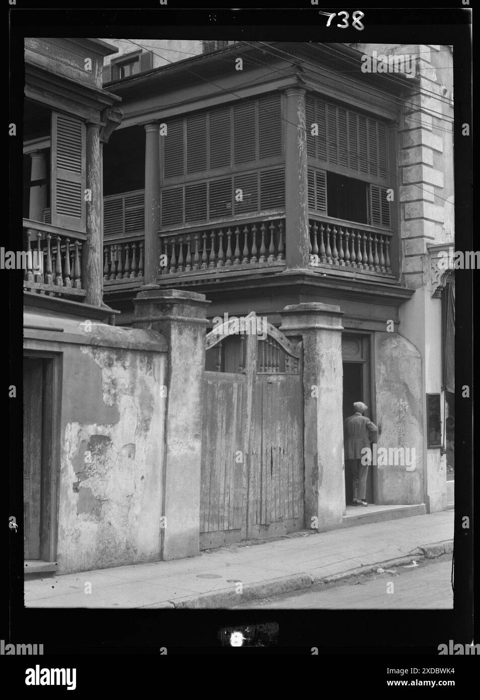 Multi-story house behind gated wall, New Orleans or Charleston, South ...