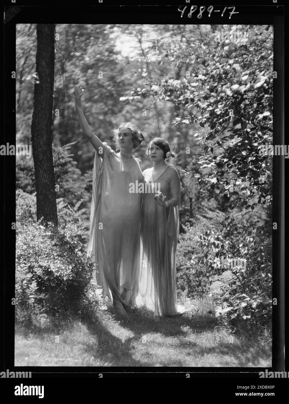 Egger, Gabrielle, Miss, and unidentified woman, standing outdoors ...