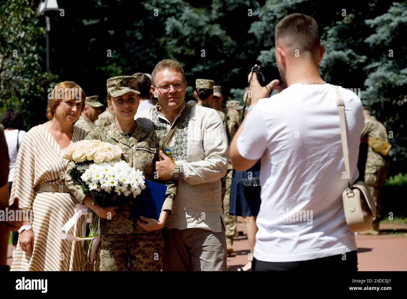 KYIV, UKRAINE - JUNE 21, 2024 - A graduate in a military uniform ...