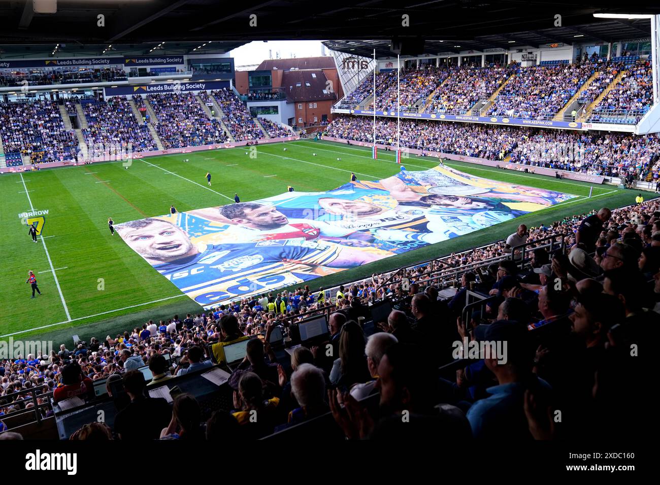 A general view of a large banner on the field in tribute to Rob Burrow ...