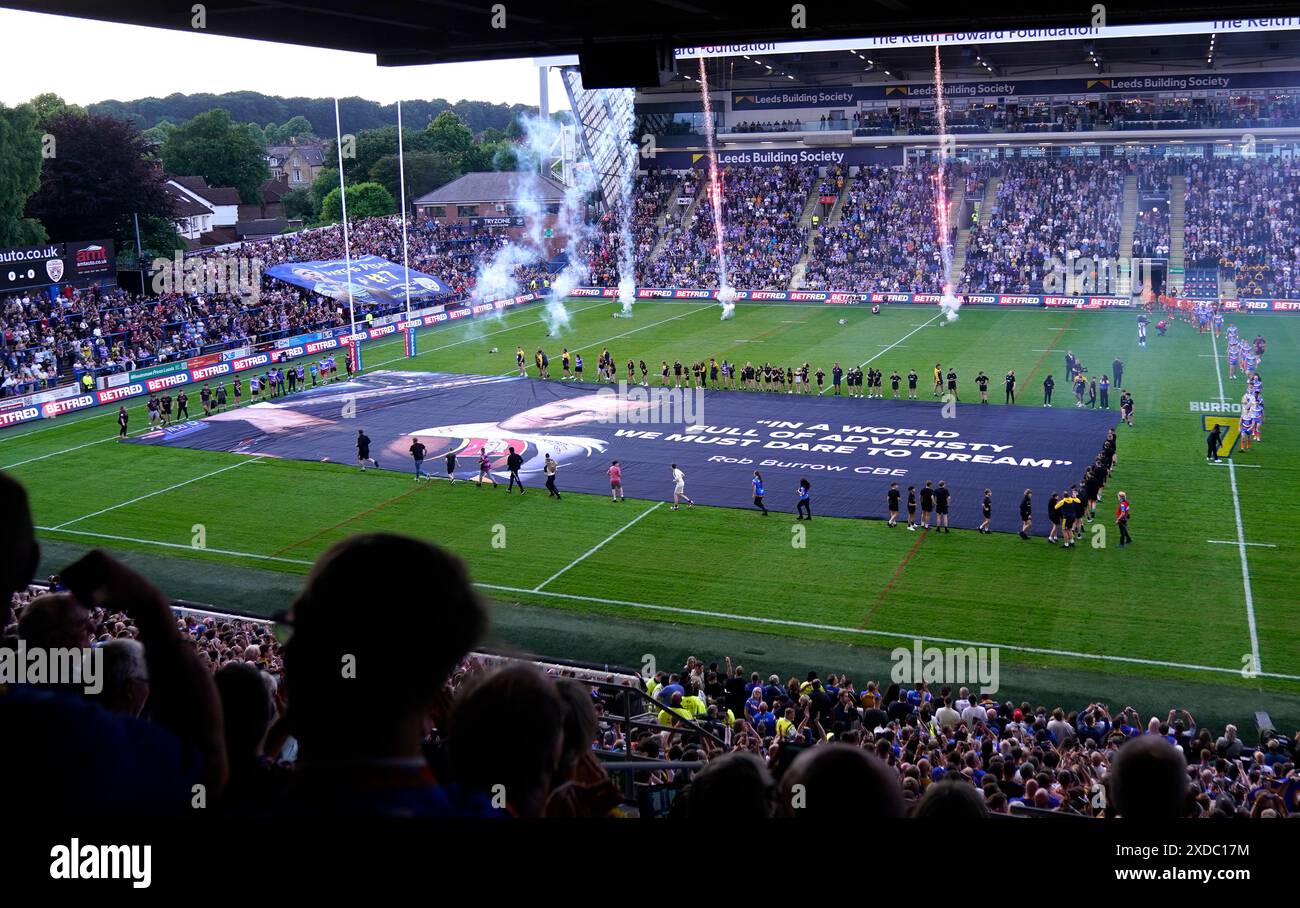 A general view of a large banner on the field in tribute to Rob Burrow ...