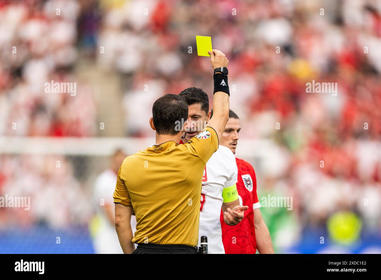 Berlin, Germany. 21st, June 2024. Referee Halil Meler of Austria books ...