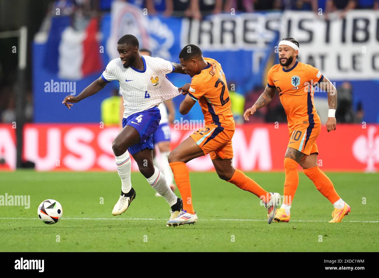 France's Dayot Upamecano (left) and Netherlands's Denzel Dumfries ...