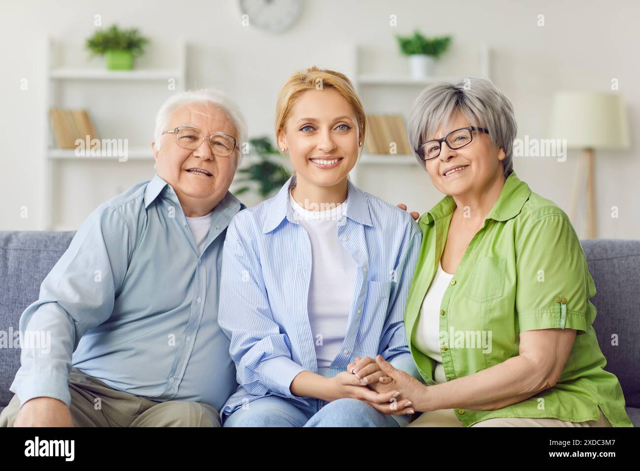 Kind caregiver helping older woman hi-res stock photography and images ...