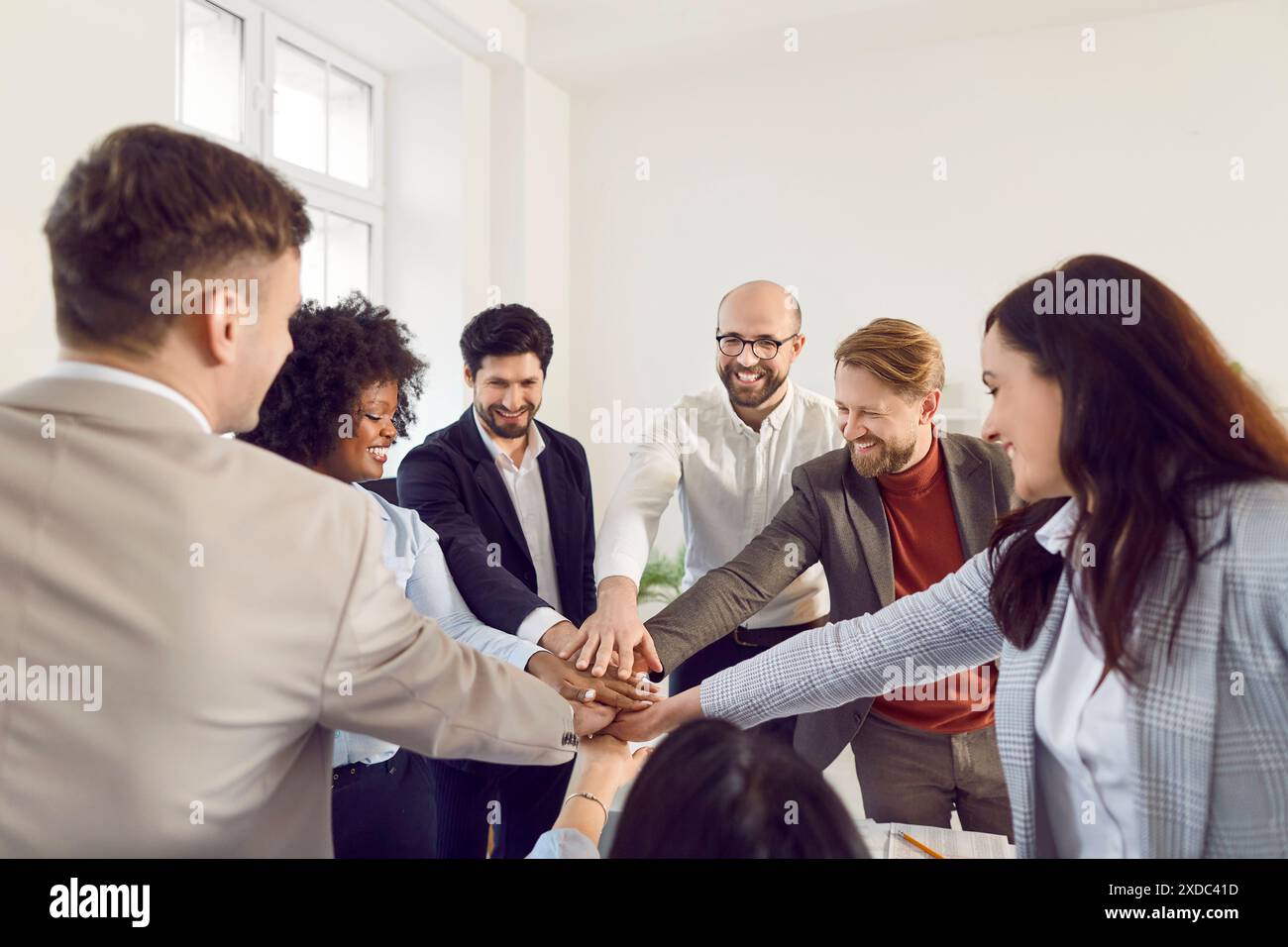 Joined hands in circle hi-res stock photography and images - Alamy
