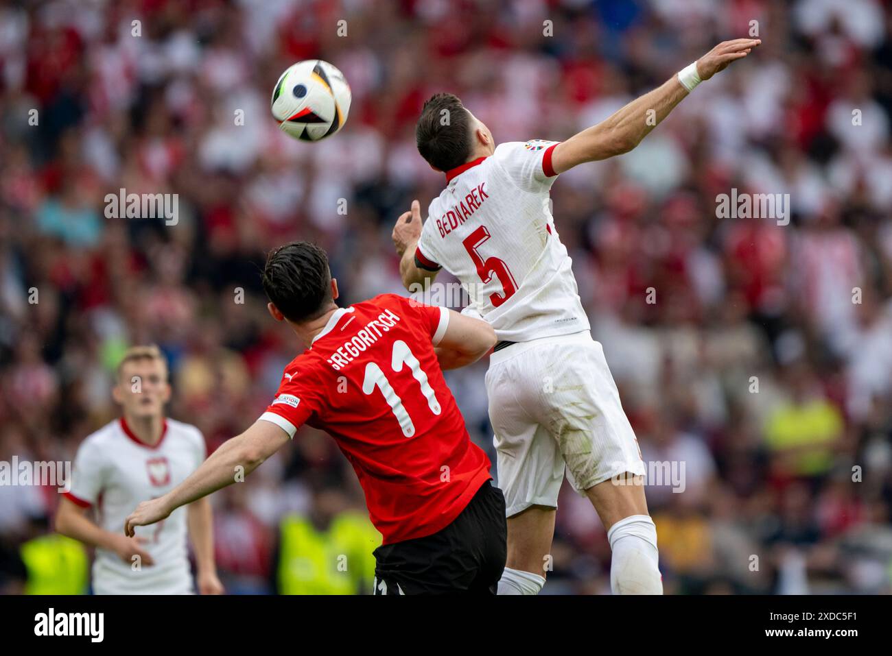 Michael Gregoritsch of Austria and Jan Bednarek of Poland during the ...