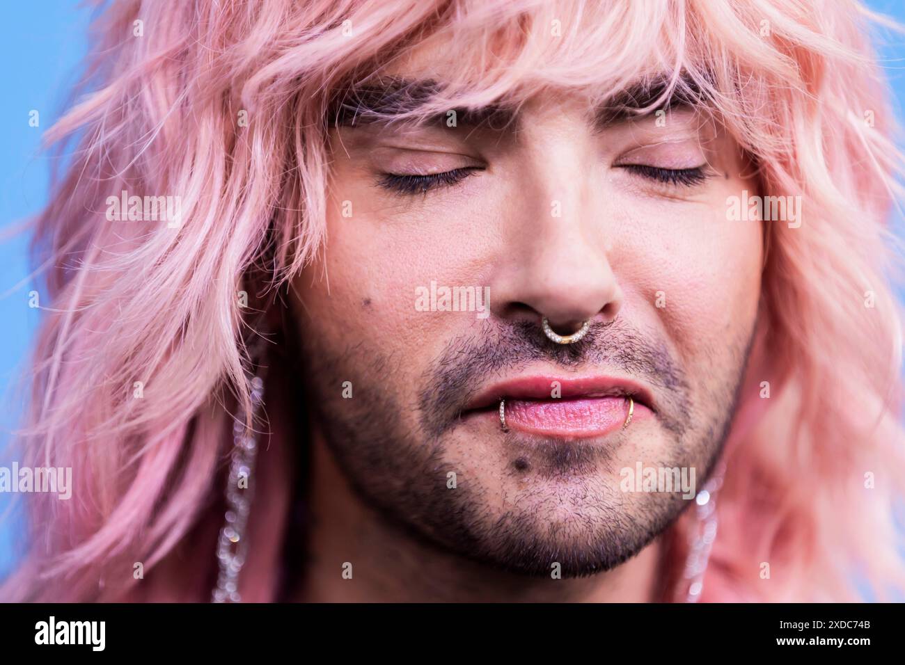 21 June 2024, Berlin: Bill Kaulitz, singer, stands on the red carpet ...