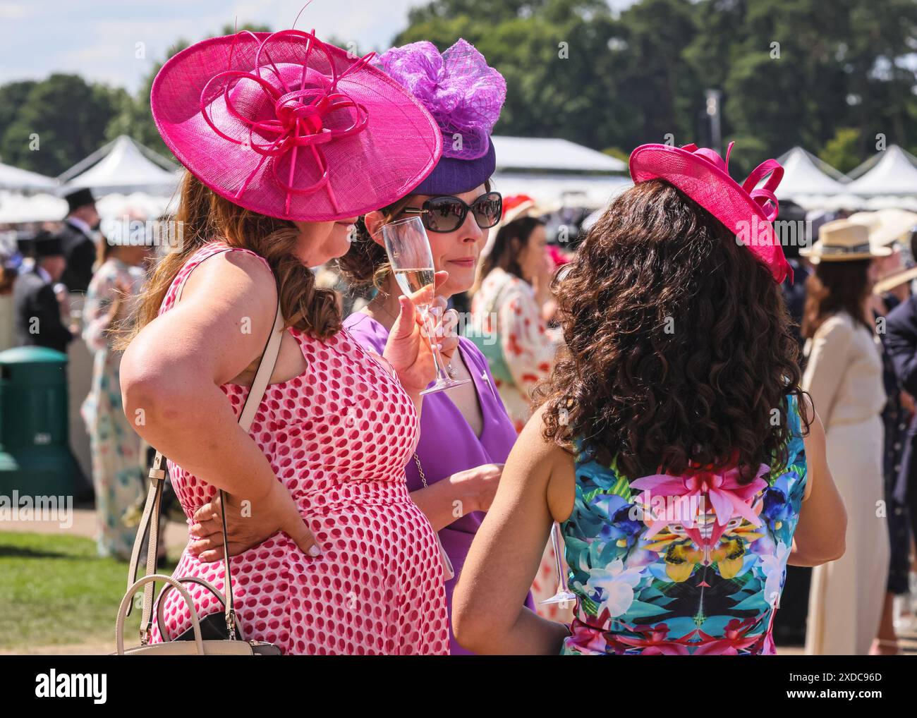Ascot, Berkshire, UK. 21st June, 2024. Racegoers enjoy their afternoon ...