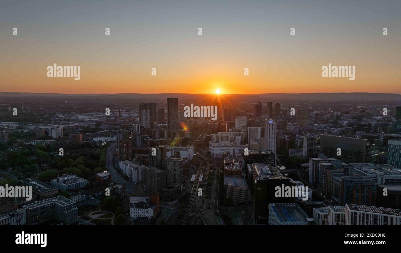 A breathtaking capture of the sunset over Manchester's skyline ...