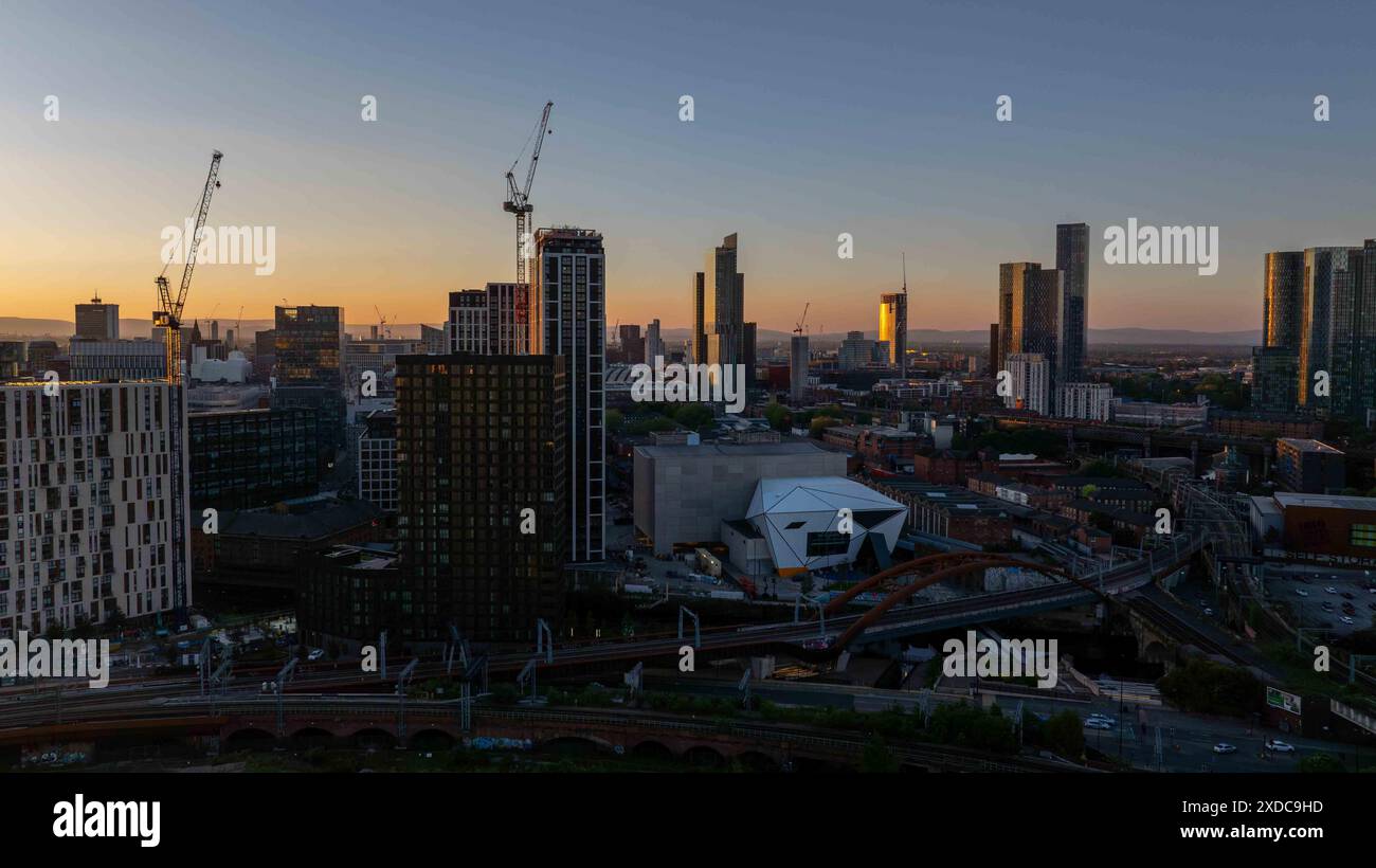 The twilight sets on Manchester, with the city's skyline including The ...