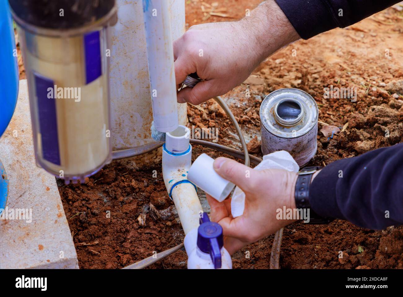 Water is being connected to well system to pump water to house Stock ...