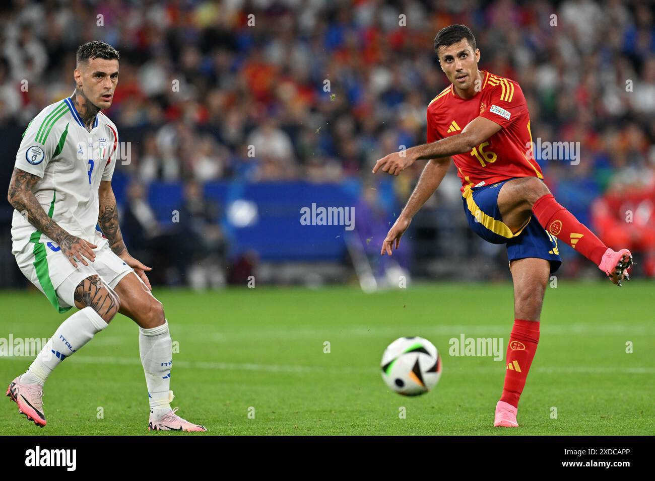 Gianluca Scamacca (9) of Italy defending on Rodri (Rodrigo Hernandez ...