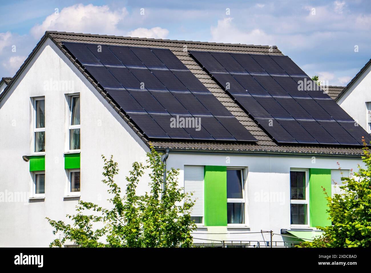 Solar roof, solar panels on a pitched roof of a residential building ...