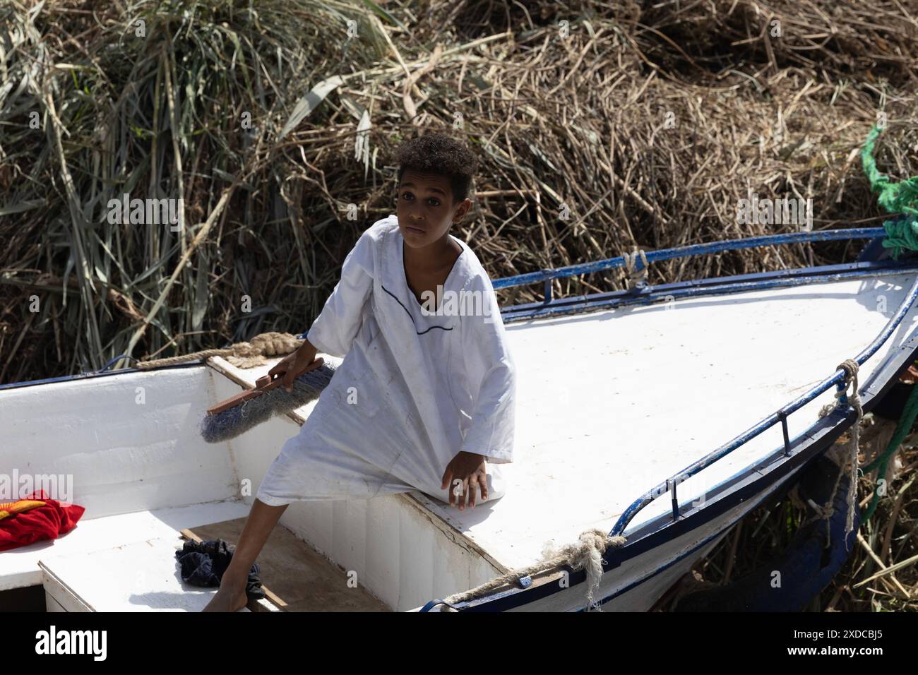 Egyptian boy in the boat hi-res stock photography and images - Alamy