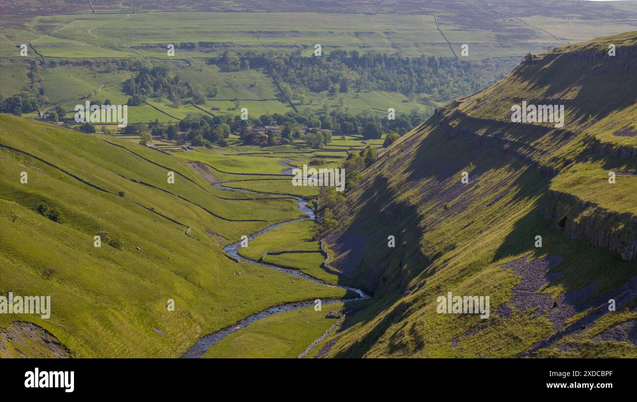 A lush landscape capturing the essence of Arncliffe with its meandering ...