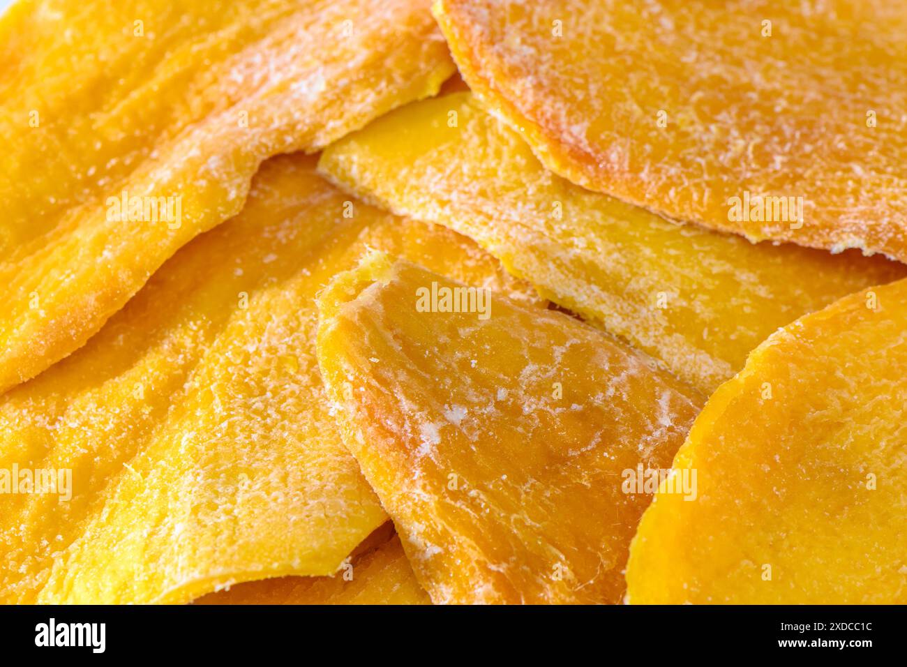 Mango. dry mango on the background 2 Stock Photo - Alamy