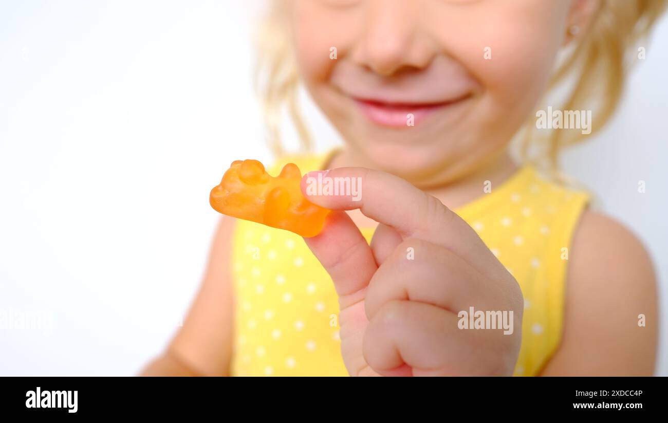 Children eating jelly sweets hi-res stock photography and images - Alamy