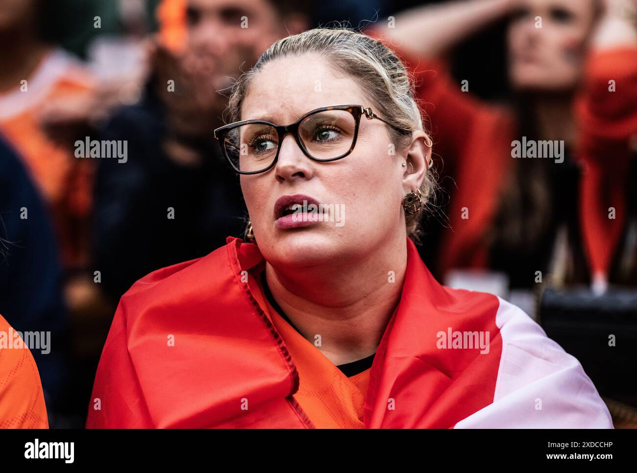 AMSTERDAM - Dutch fans follow the second group match of the European ...