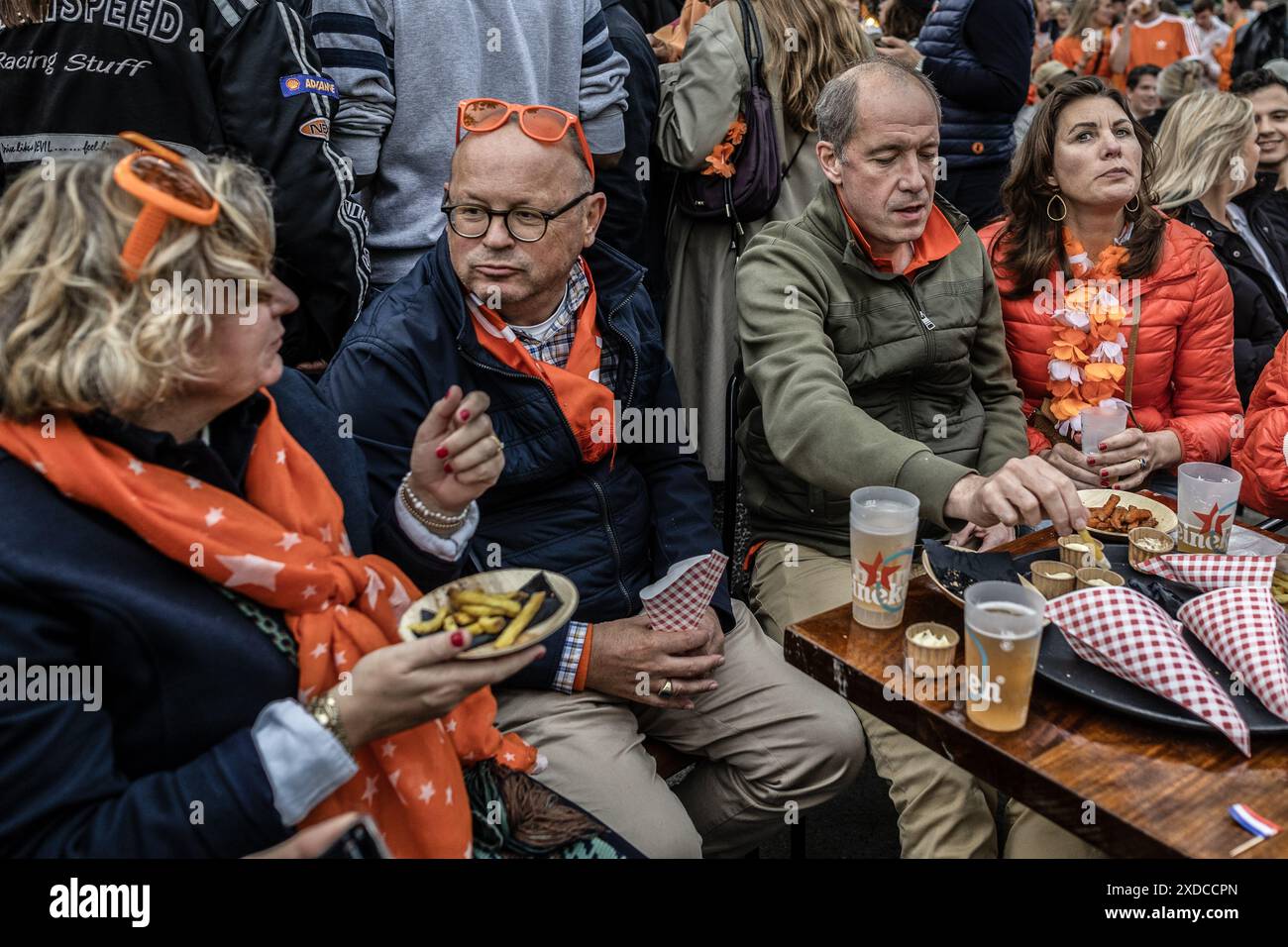 AMSTERDAM - Dutch fans follow the second group match of the European ...
