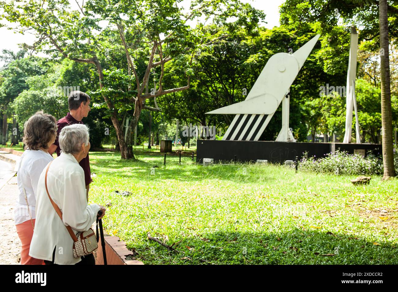 Cali, Colombia - June 17, 2024: Group of tourists looking at the ...
