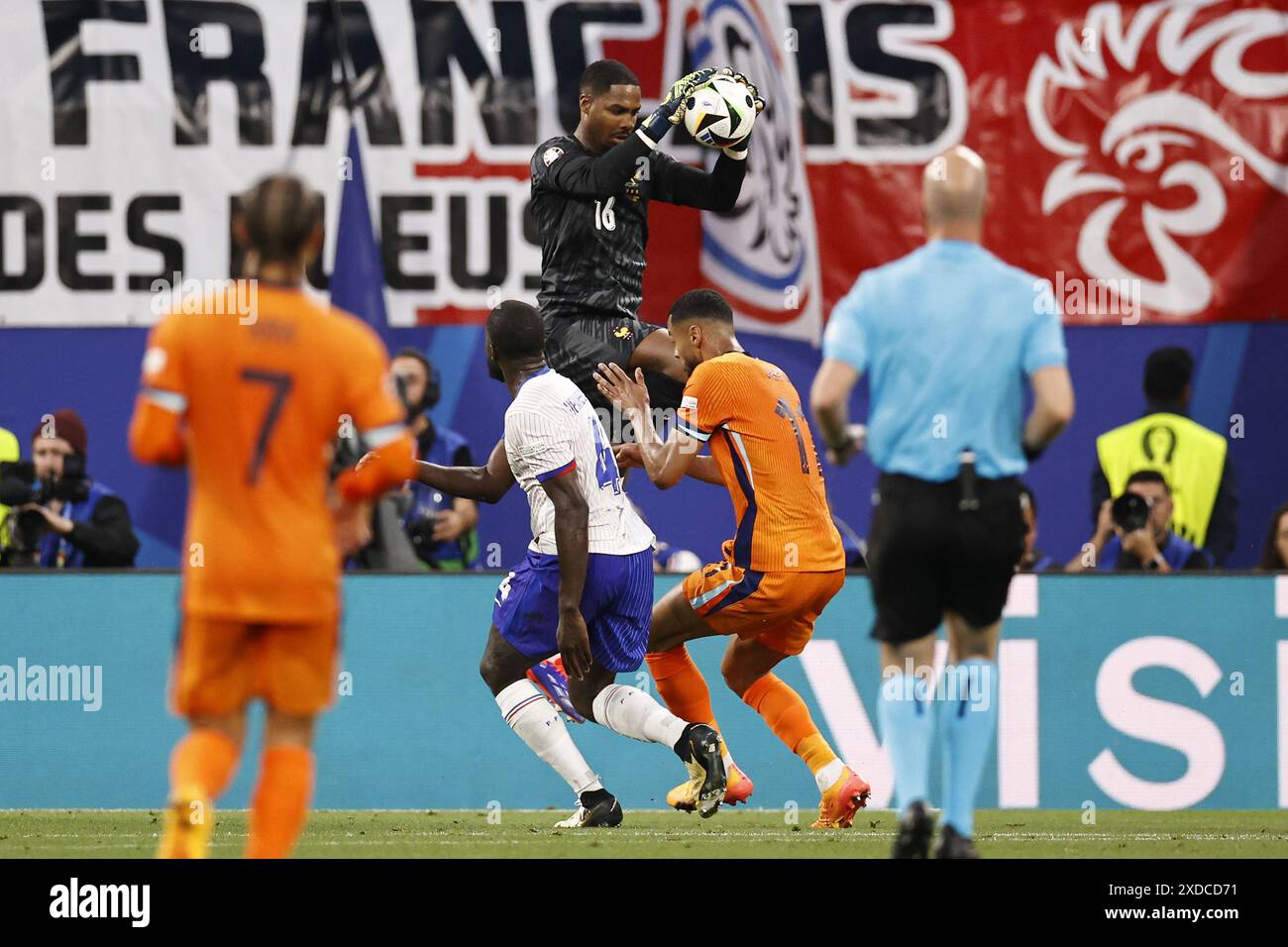 LEIPZIG - (l-r) France goalkeeper Mike Maignan, Dayot Upamecano of ...