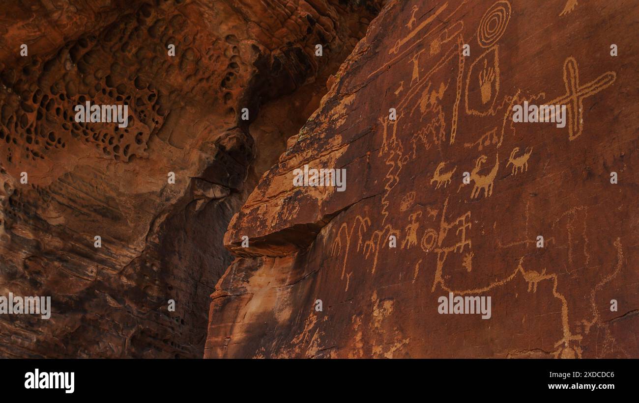 Prehistoric petroglyphs sheltered within a natural canopy at Atlatl ...