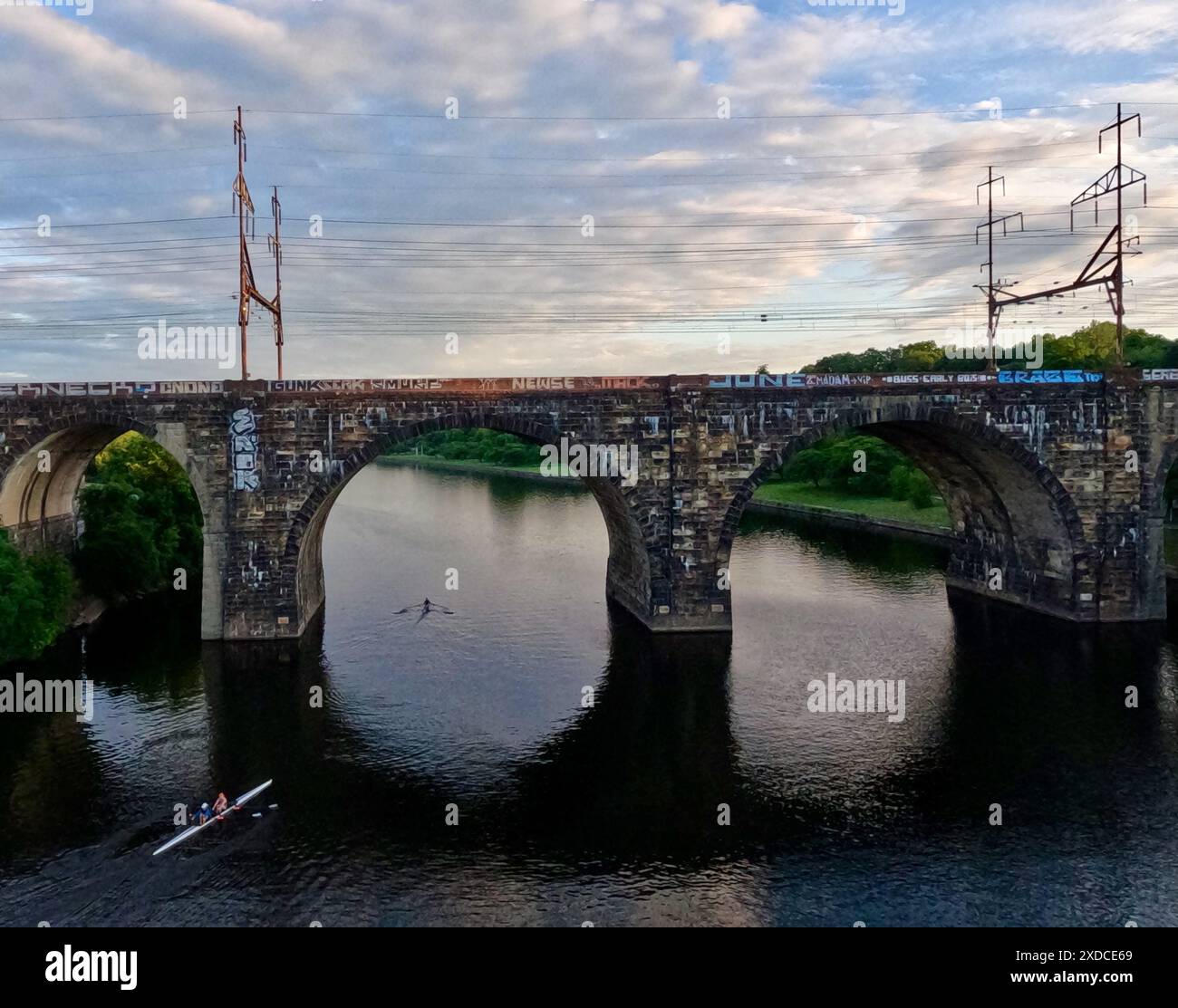 Rowers head through the arches of the Pennsylvania Railroad, Connecting ...