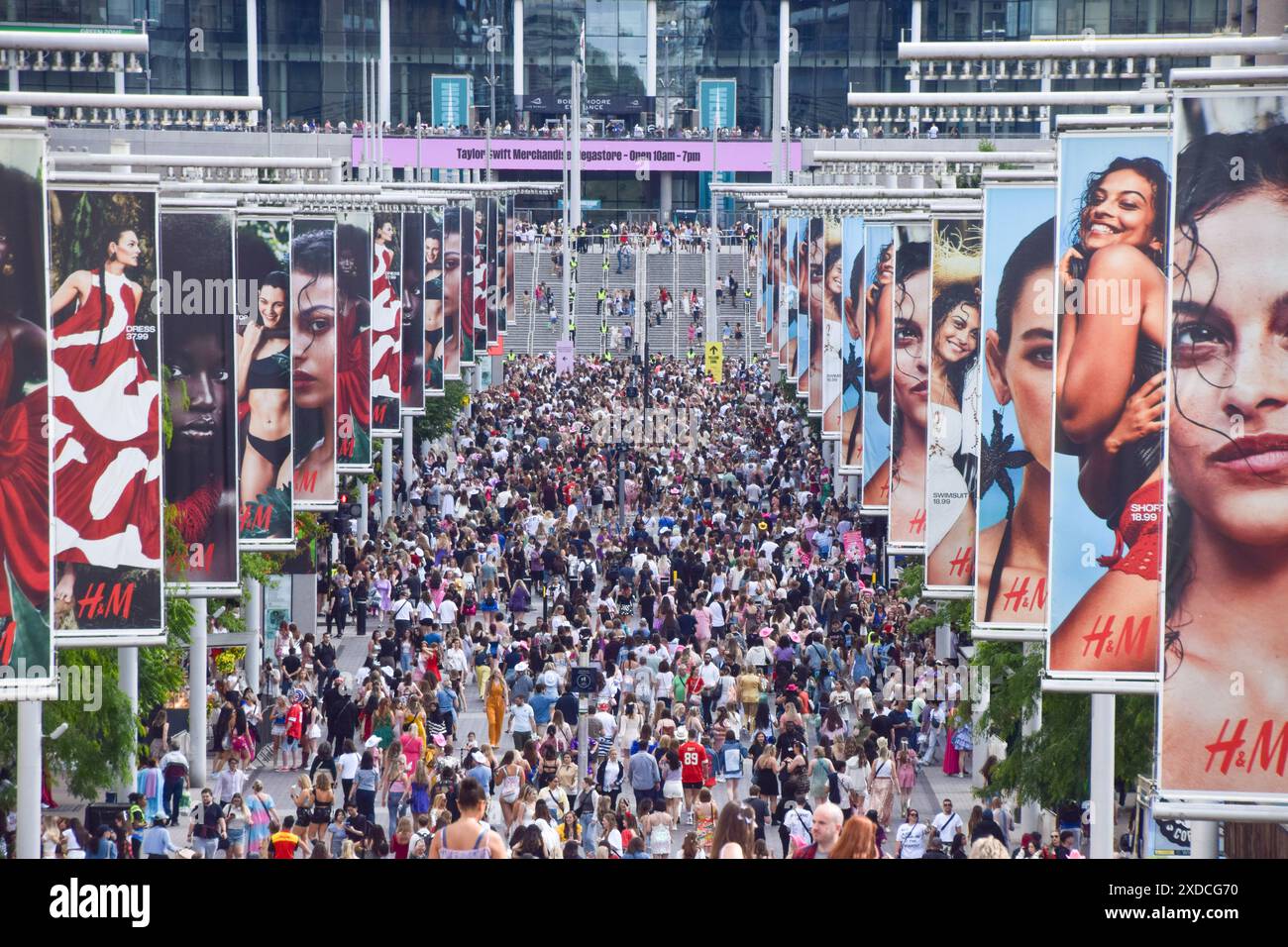 London, UK. 21st June 2024. Swifties arrive at Wembley Stadium as ...