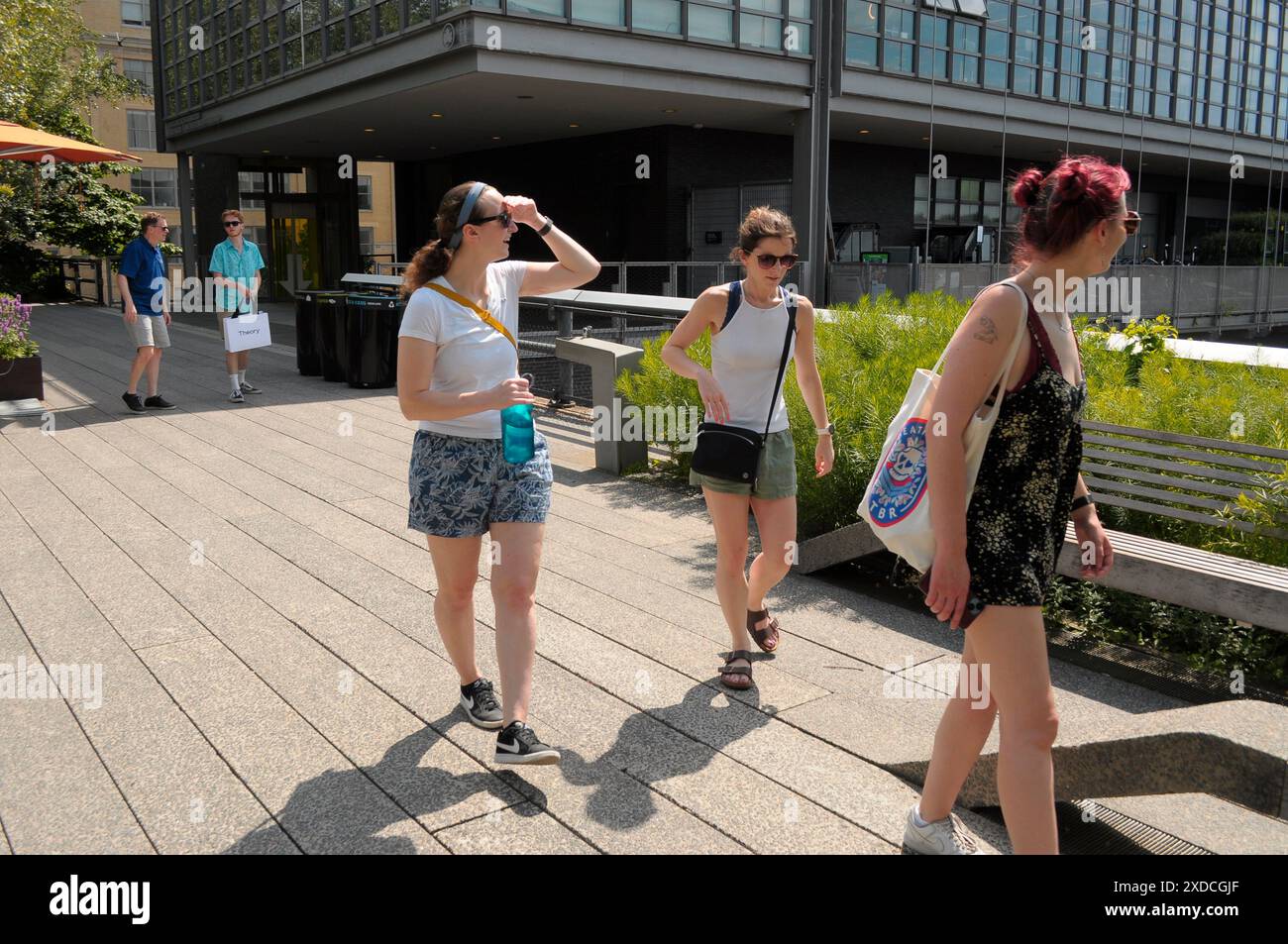 New York, United States. 20th June, 2024. Pedestrians walk in hot ...