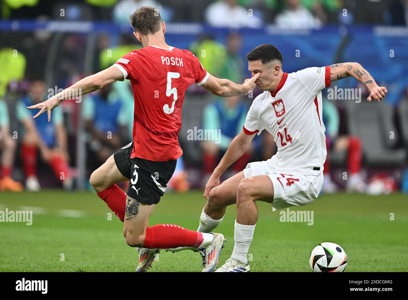 BERLIN, GERMANY - JUNE 21: Stefan Posch of Austria and Bartosz Slisz of ...