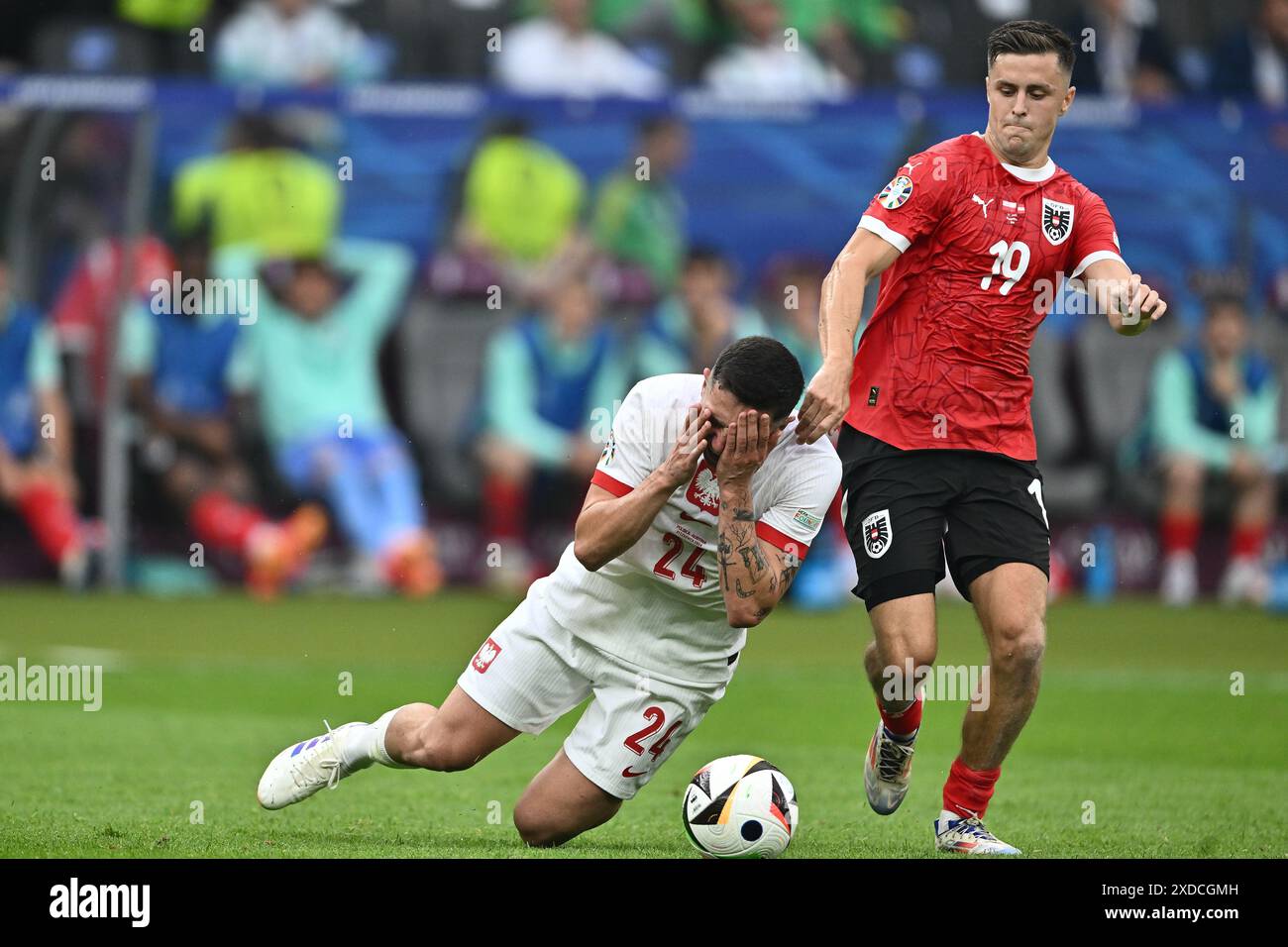 BERLIN, GERMANY - JUNE 21: Bartosz Slisz of Poland and Christoph ...