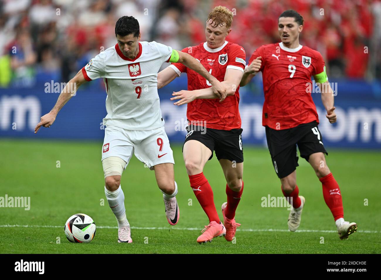 BERLIN, GERMANY - JUNE 21: Robert Lewandowski of Poland and Nicolas ...