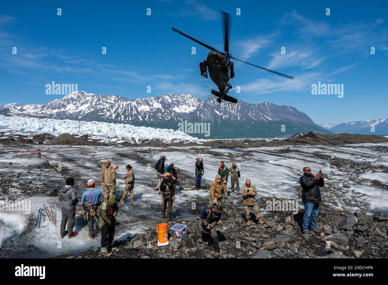 An Alaska National Guard UH-60L Black Hawk takes off at Colony Glacier ...