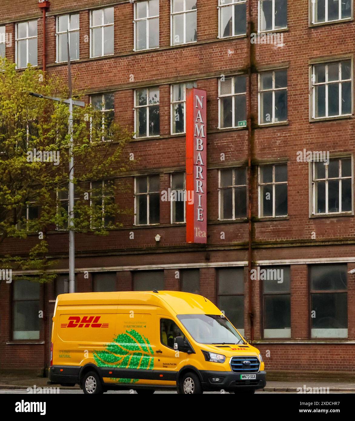 Dhl electric yellow van hi-res stock photography and images - Alamy