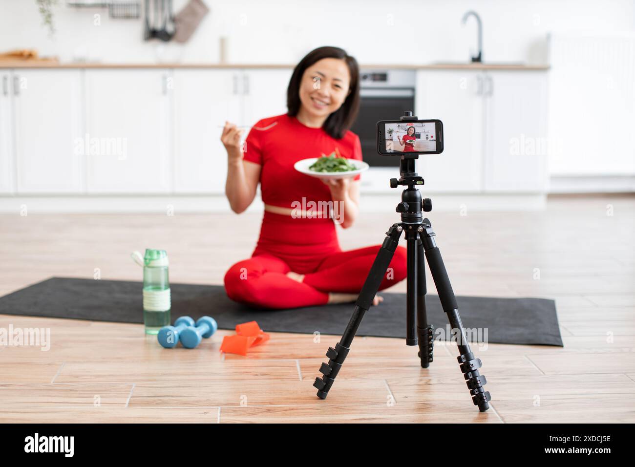Woman filming food vlog smartphone hi-res stock photography and images ...