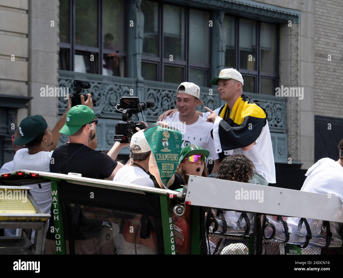Boston, Massachusetts, USA June 21, 2024 Kristaps Porzingis (left) and ...