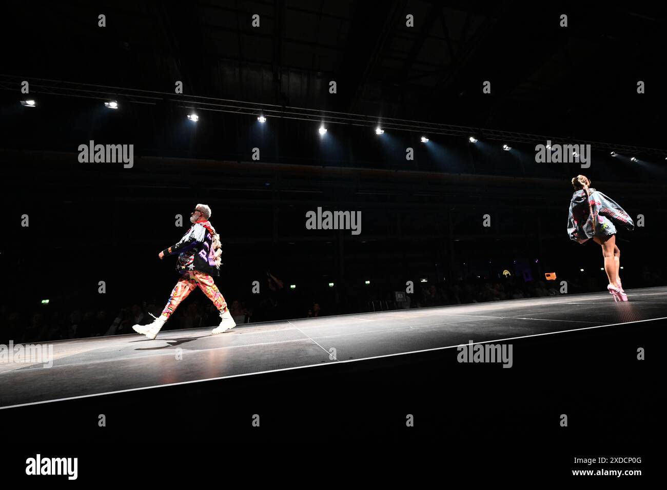 21 June 2024, Bavaria, Munich: Models by designer Pia Bolte walk the ...