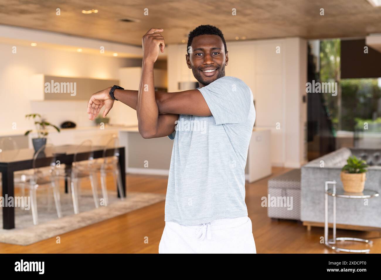 Man training stretching arm hi-res stock photography and images - Alamy