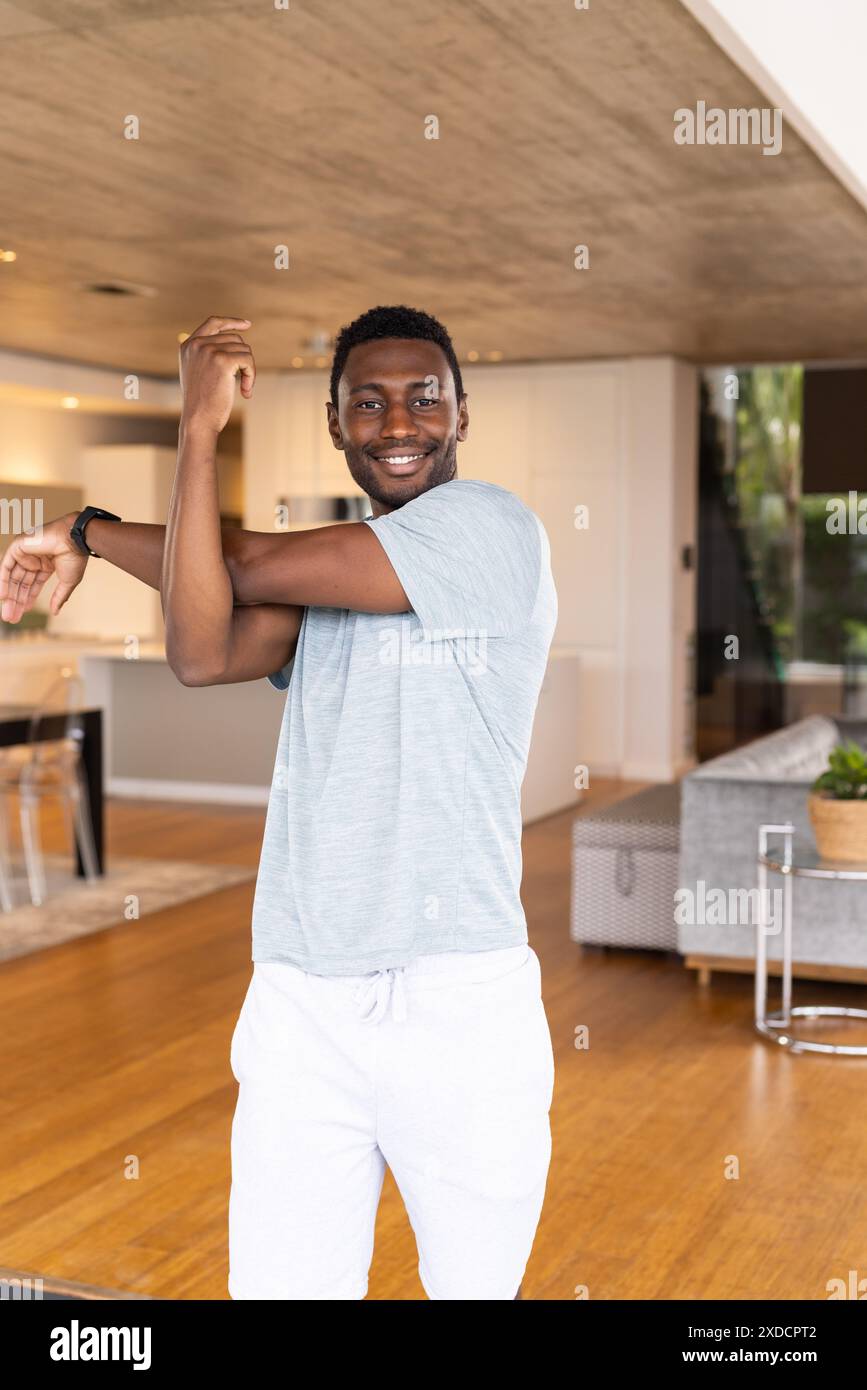 Man stretching arms hi-res stock photography and images - Alamy