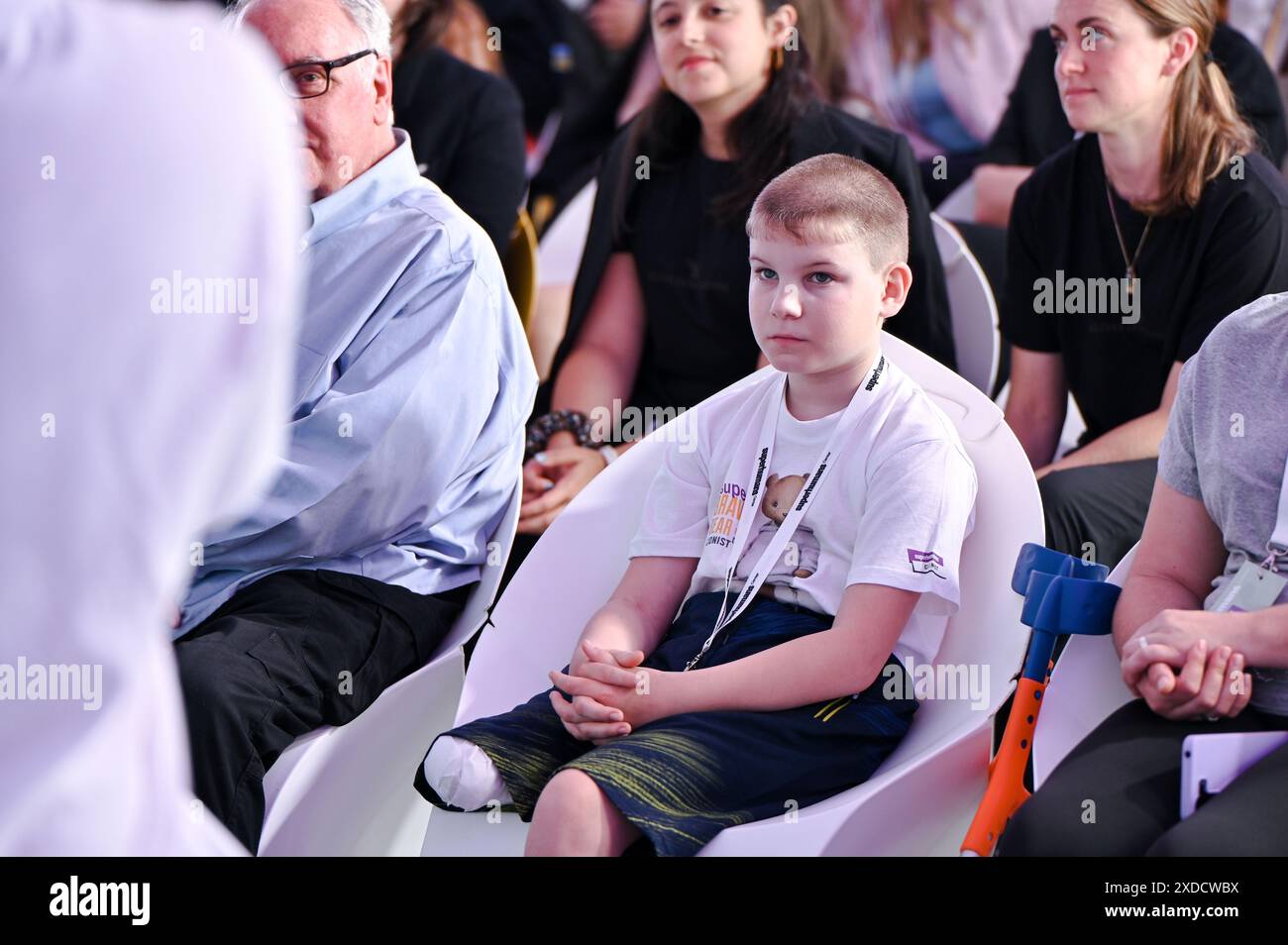 LVIV, UKRAINE - JUNE 20, 2024 - A boy partakes in the official opening ...