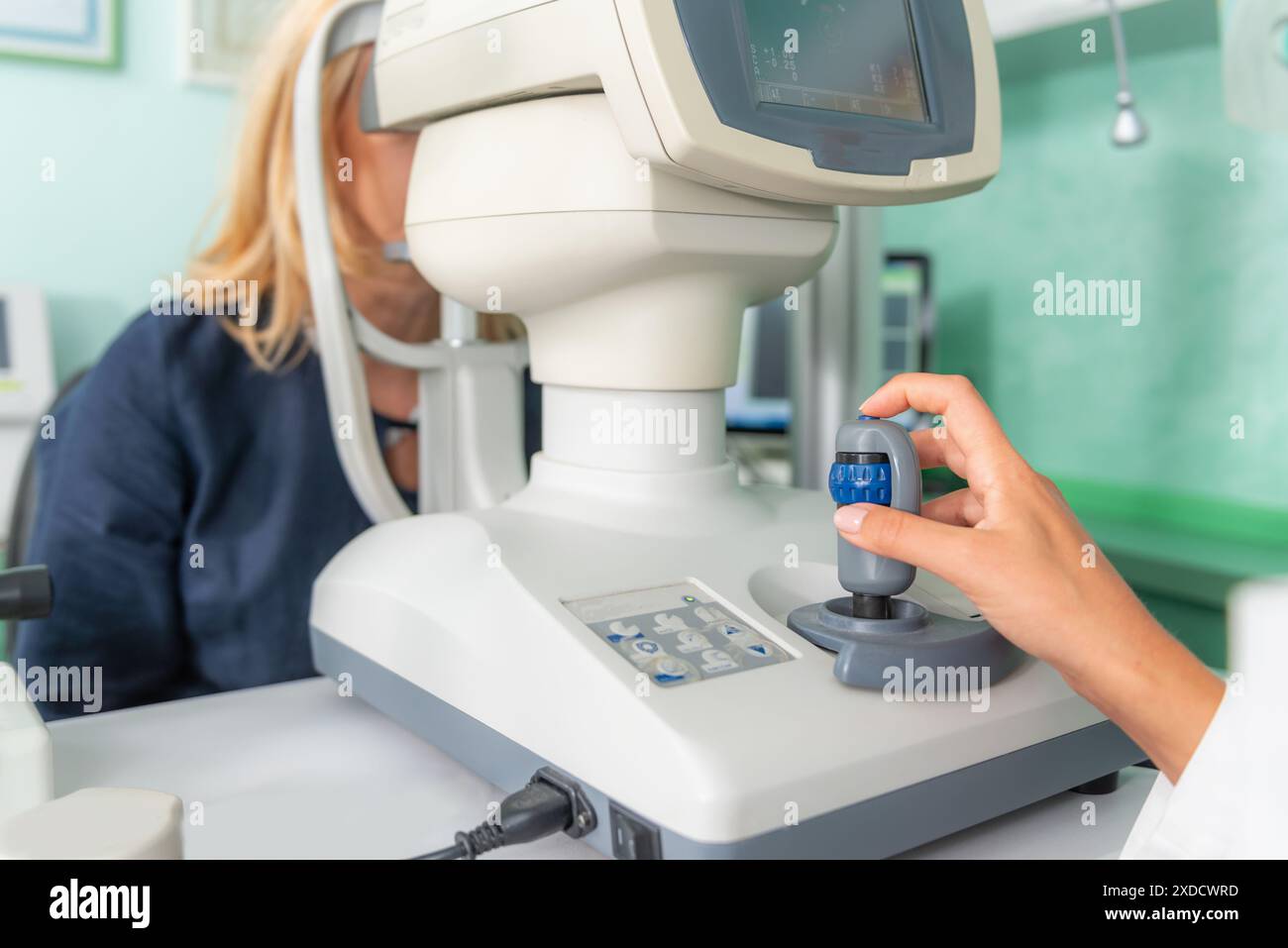 Eye examination with an auto refractometer in a professional ...