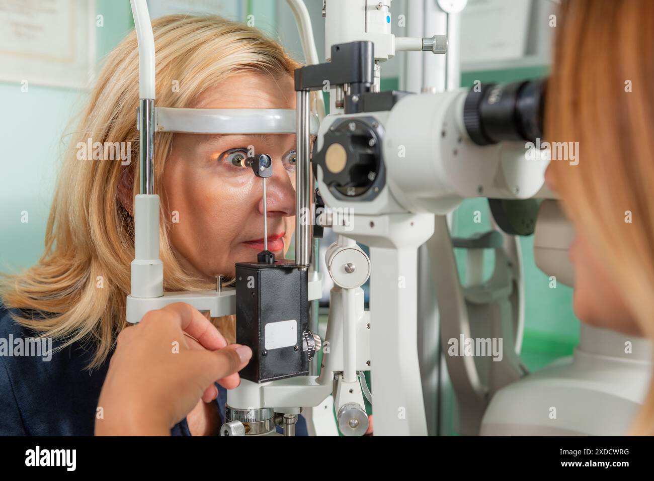 Eye pressure testing through applanation tonometry in ophthalmology ...